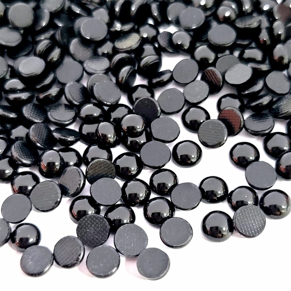 Two somewhat different black hot fix heat press pearls - Peakemb